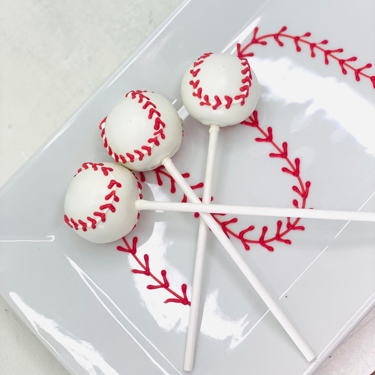 Baseball Cake Pops – sweet escape cake company